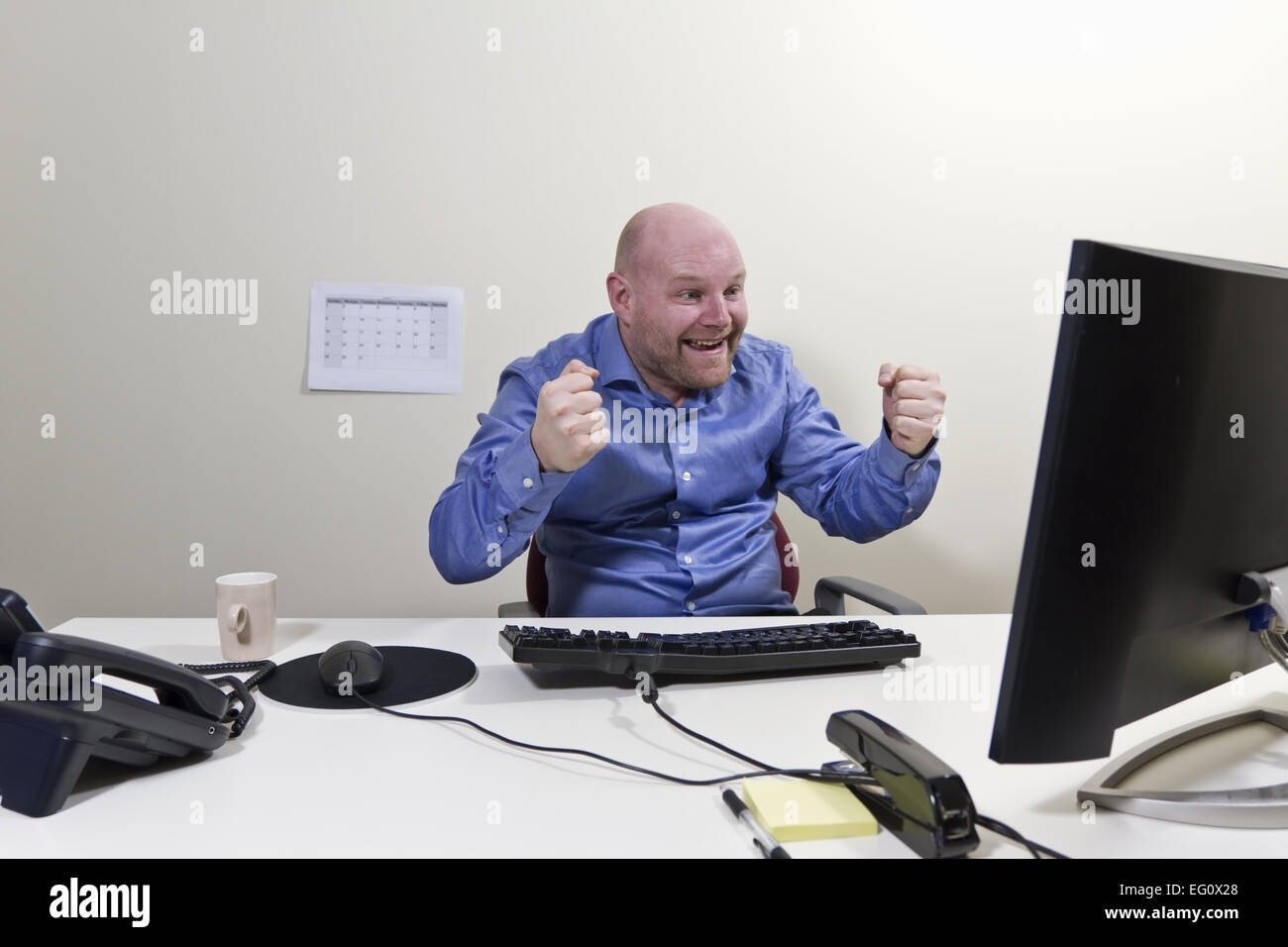 A office worker / businessman expresses success Stock Photo - Alamy