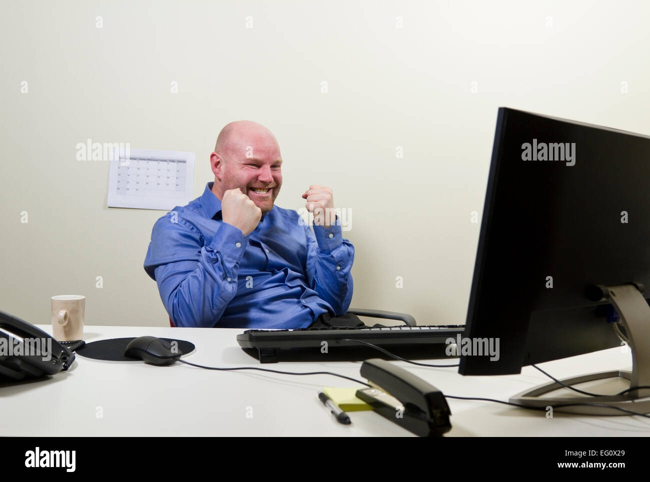 A office worker / businessman expresses success Stock Photo - Alamy