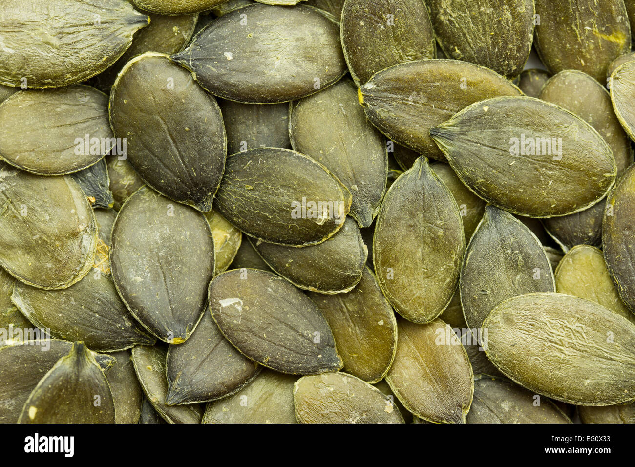 Top view of raw organic pumkin seeds / kernels. Can be used as ...
