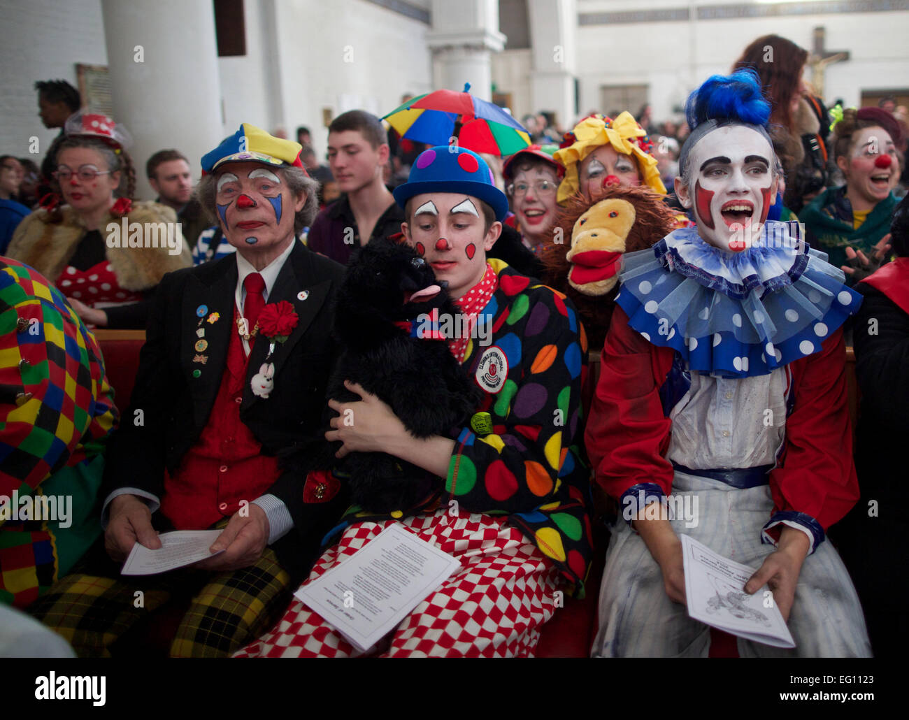 UNITED KINGDOM, London : Clowns dressed in full costume attend a ...
