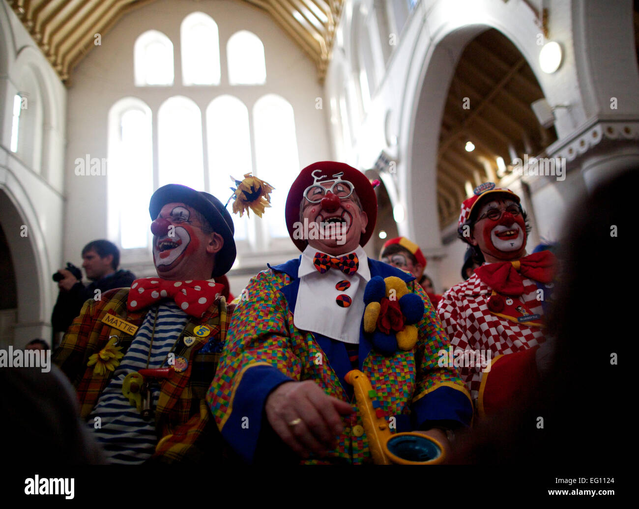 UNITED KINGDOM, London : Clowns dressed in full costume attend a ...
