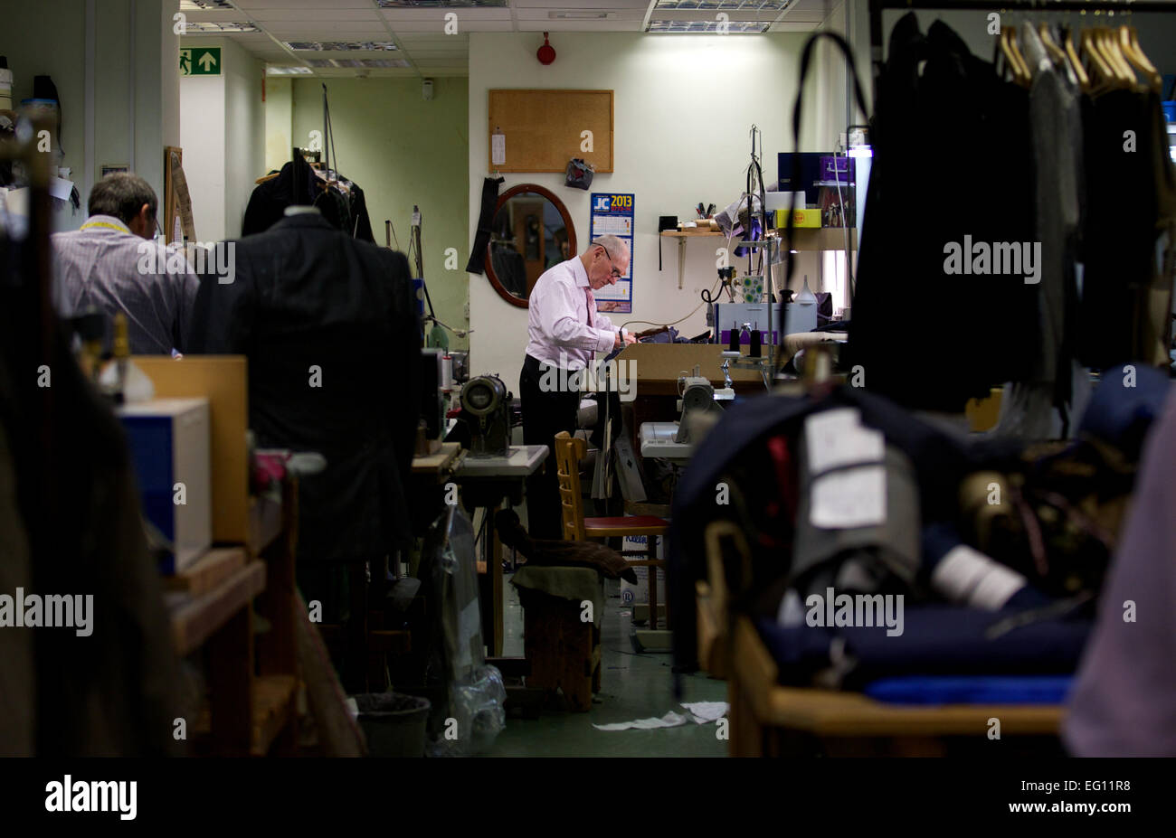 UNITED KINGDOM, London : Tailor Emily Squires poses for a photo inside ...