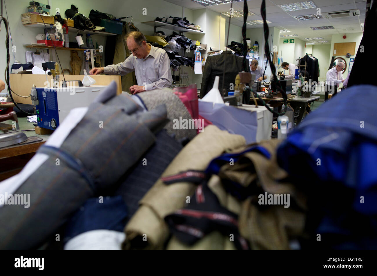 UNITED KINGDOM, London : Tailor Emily Squires poses for a photo inside ...
