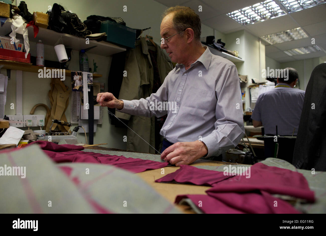 UNITED KINGDOM, London : Tailor Emily Squires poses for a photo inside ...