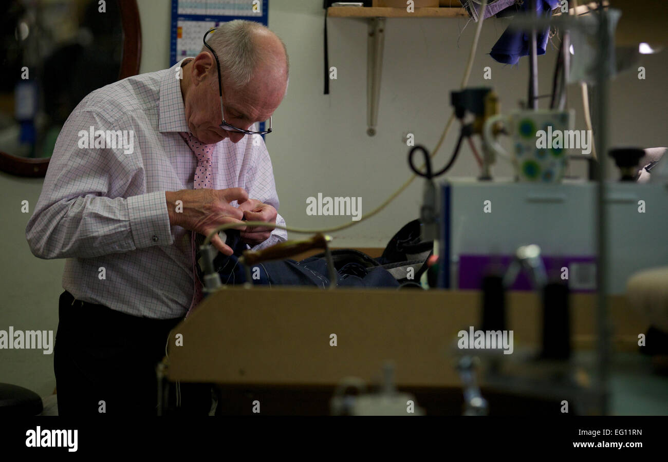 UNITED KINGDOM, London : Tailor Emily Squires poses for a photo inside ...