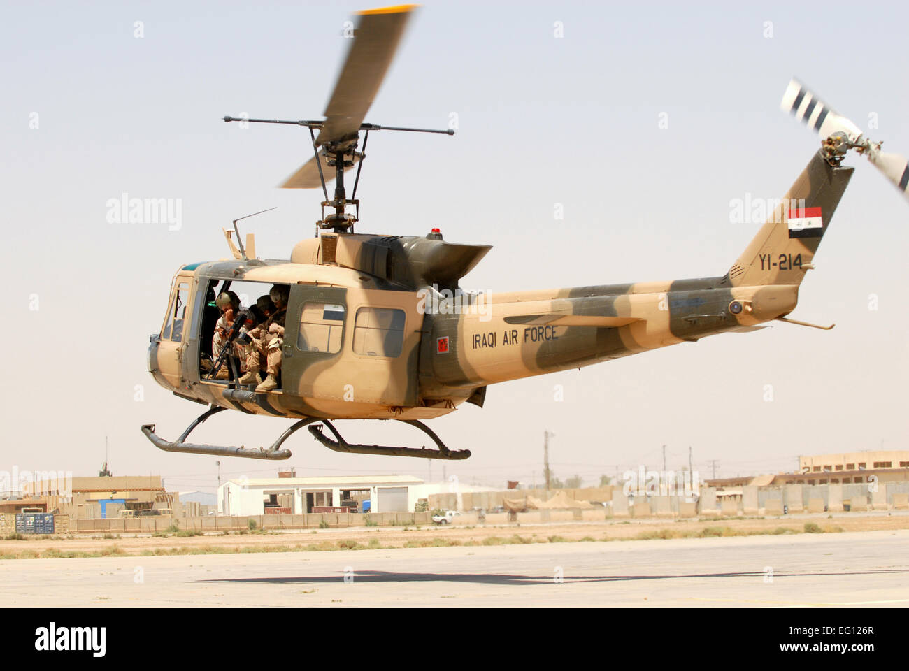 An Iraqi air force HH-60 Huey II takes off on an aerial gunner training ...