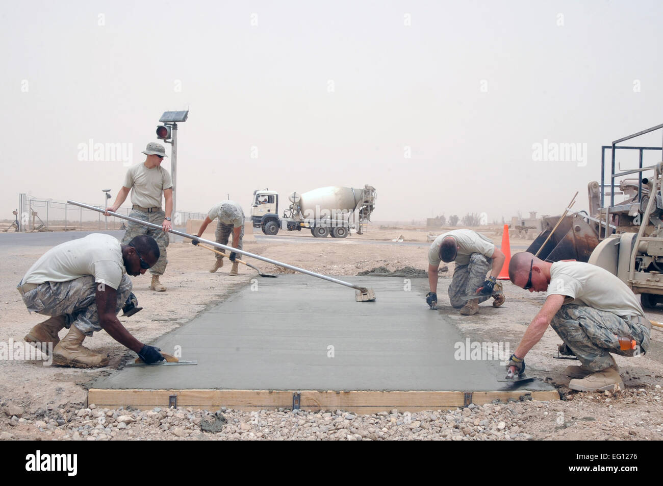 U.S. Airmen of the 407th Expeditionary Civil Engineer Squadron pavement ...