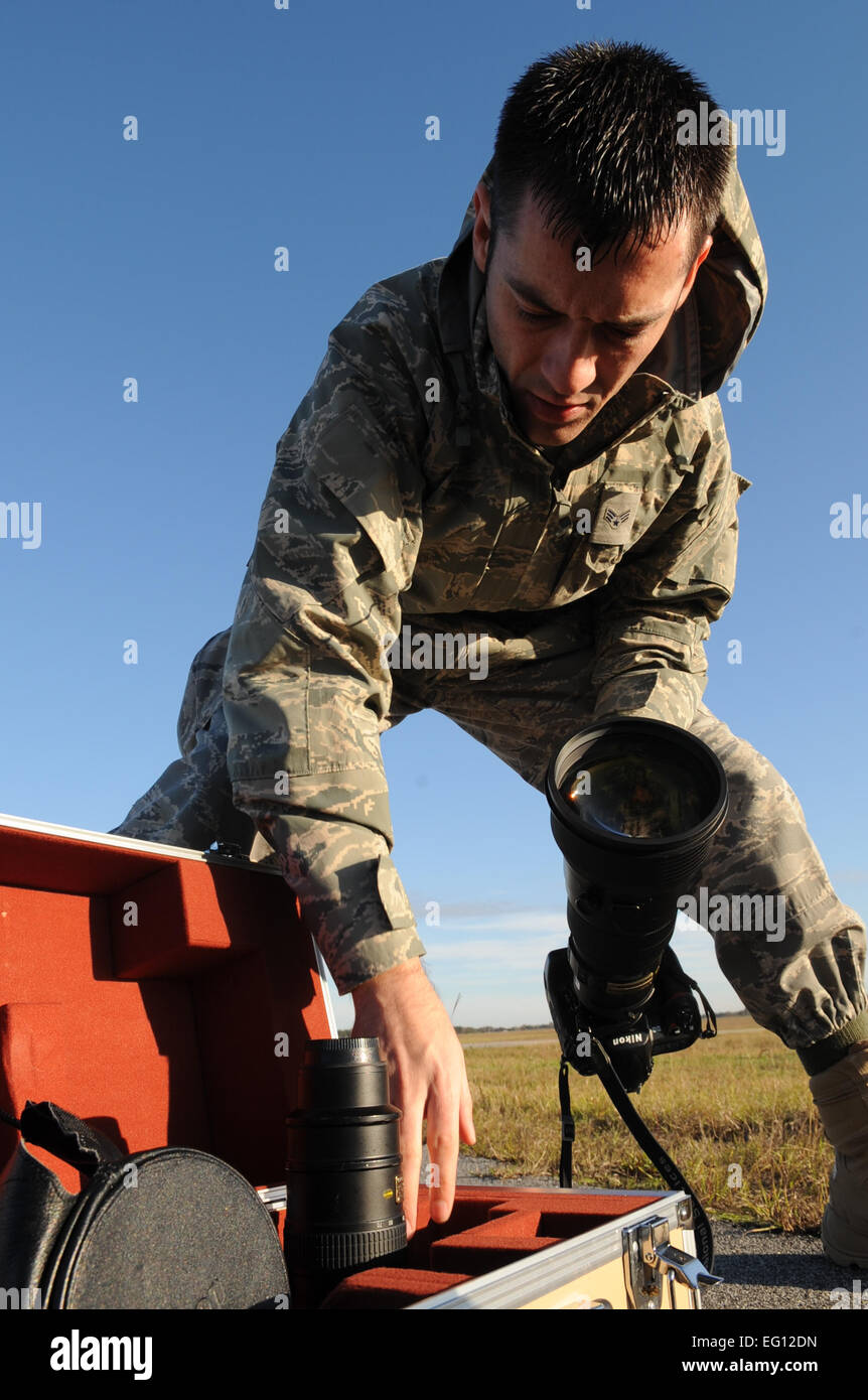 Senior Airman Daniel Owen, 1st Combat Camera Squadron, prepares to ...