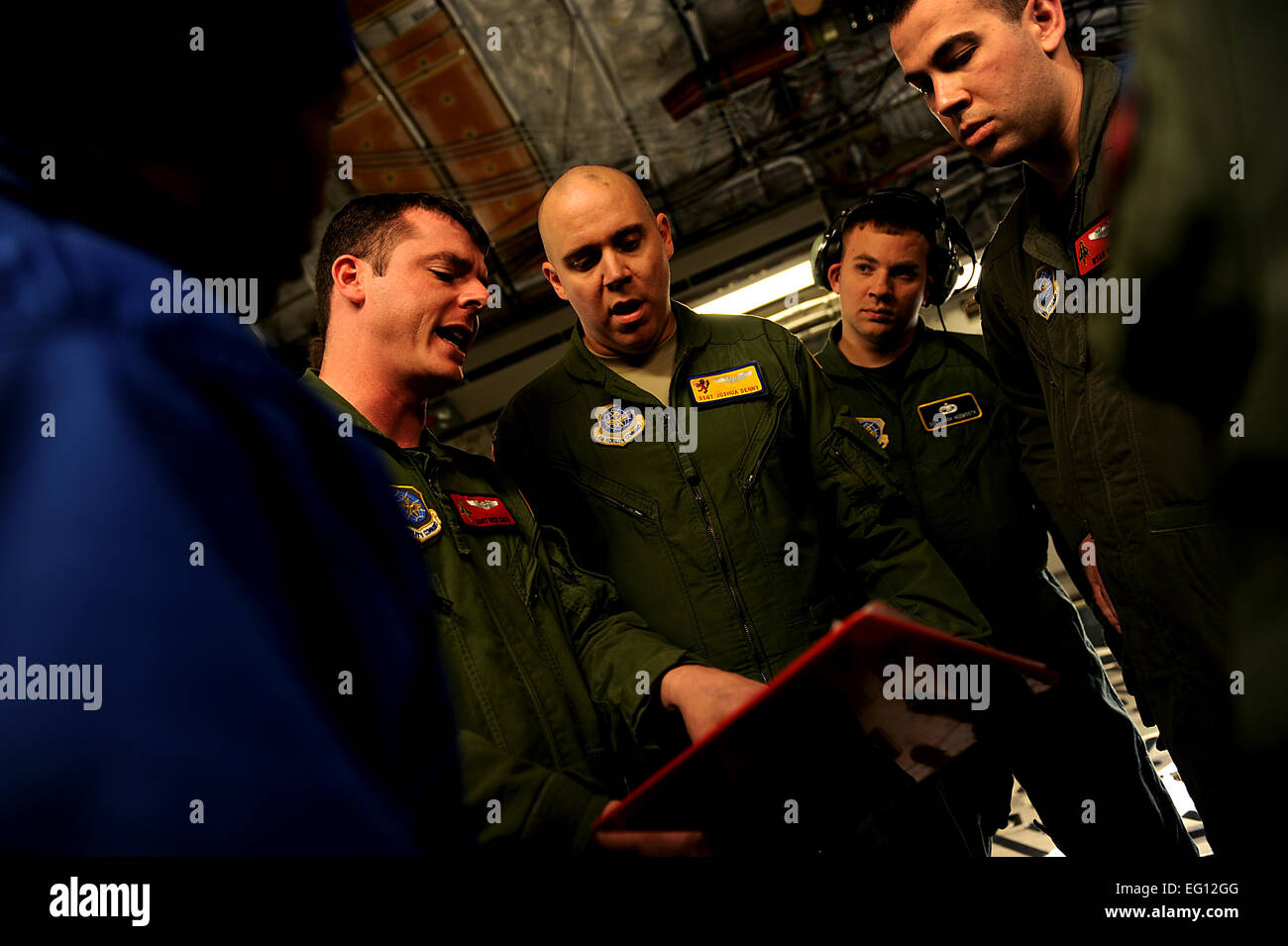 C-17 Loadmaster Staff Sgt. Benjamin Cato from the 21st Airlift Squadron ...