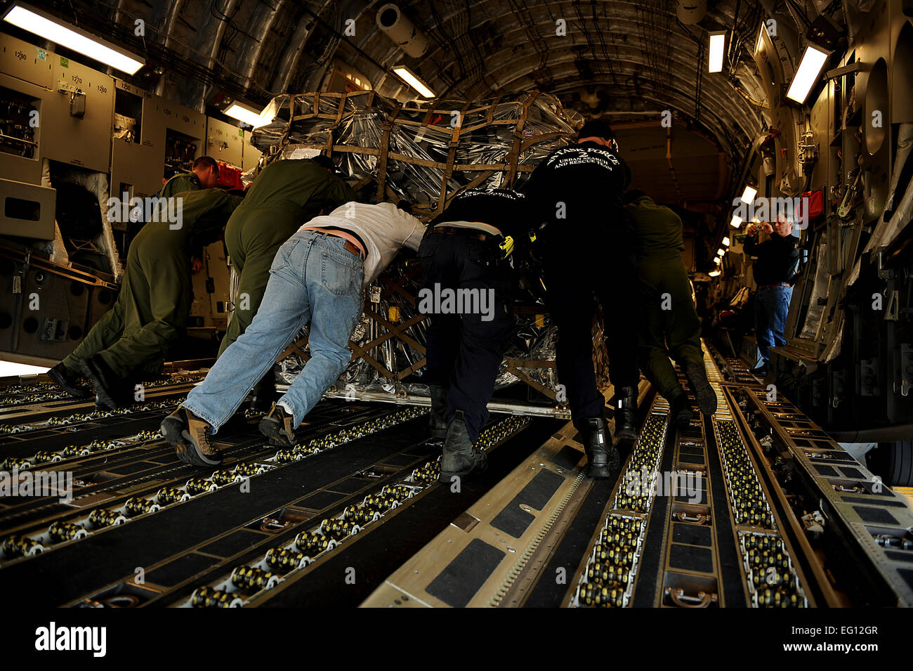 A C-17 Globemaster crew from the 21st Airlift Squadron, Travis AFB, CA ...