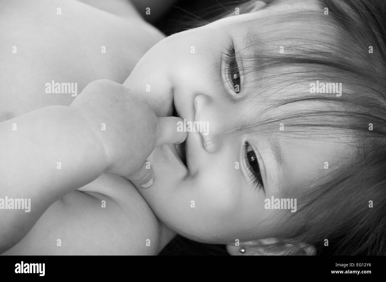 portrait of adorable brunette baby girl Stock Photo - Alamy