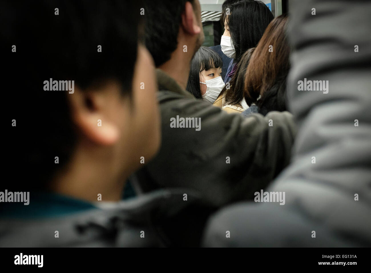Commuters on the Tokyo subway. The combined subway network of the Tokyo ...