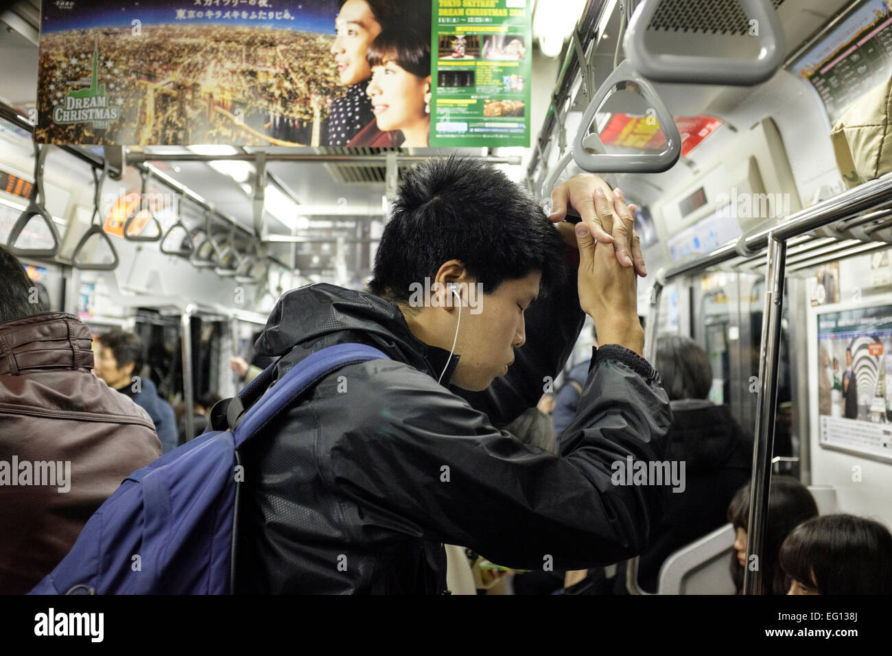 Asleep on the subway hi-res stock photography and images - Alamy