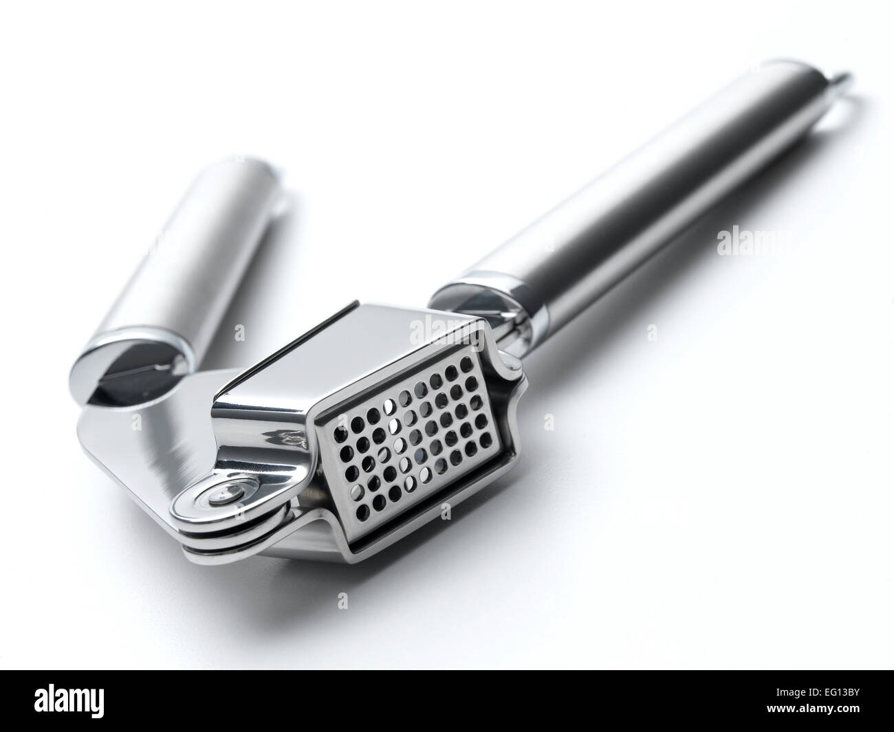 Garlic press isolated Stock Photo - Alamy