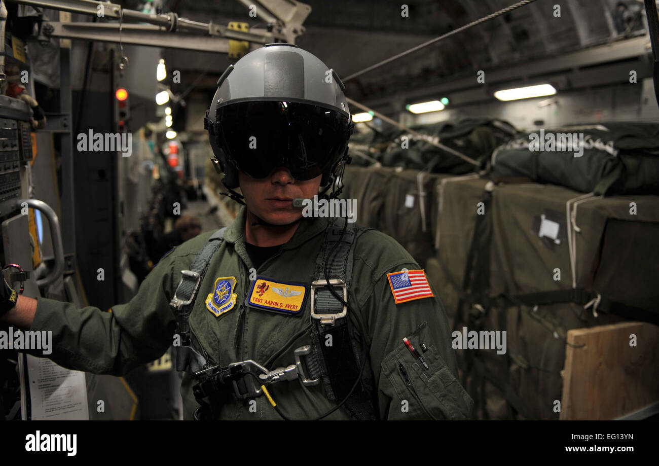 100118-F-2034C-061 Tech. Sgt. Aaron Avery prepares to open the ramp ...