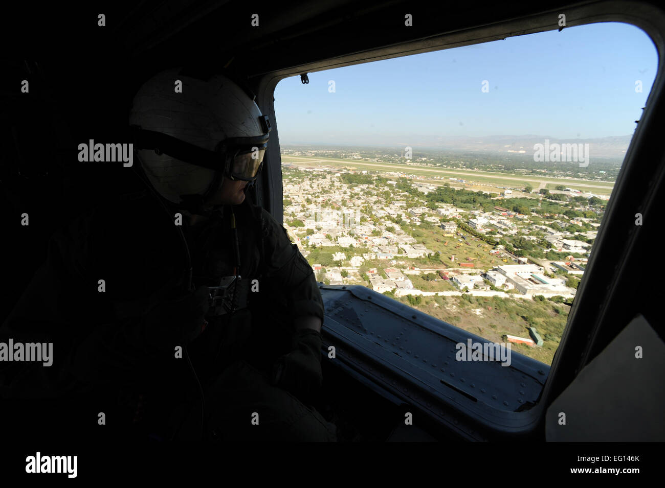 U.S. Navy AWR2 Troy Reaves a U.S. Navy HH-60 Aircrew member from ...