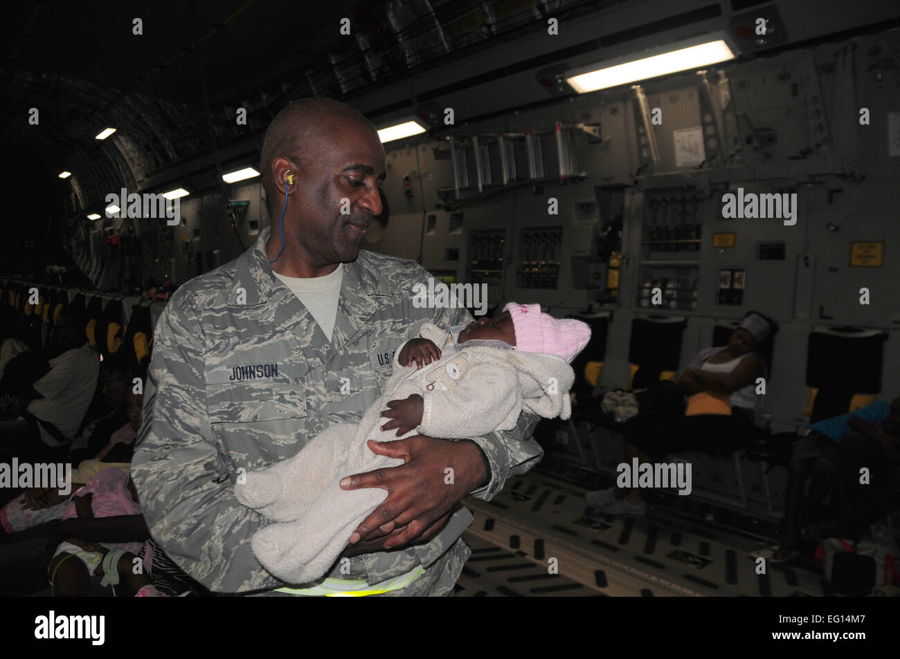 Master Sergeant Alvin Johnson, Air National Guardsman, takes time out ...
