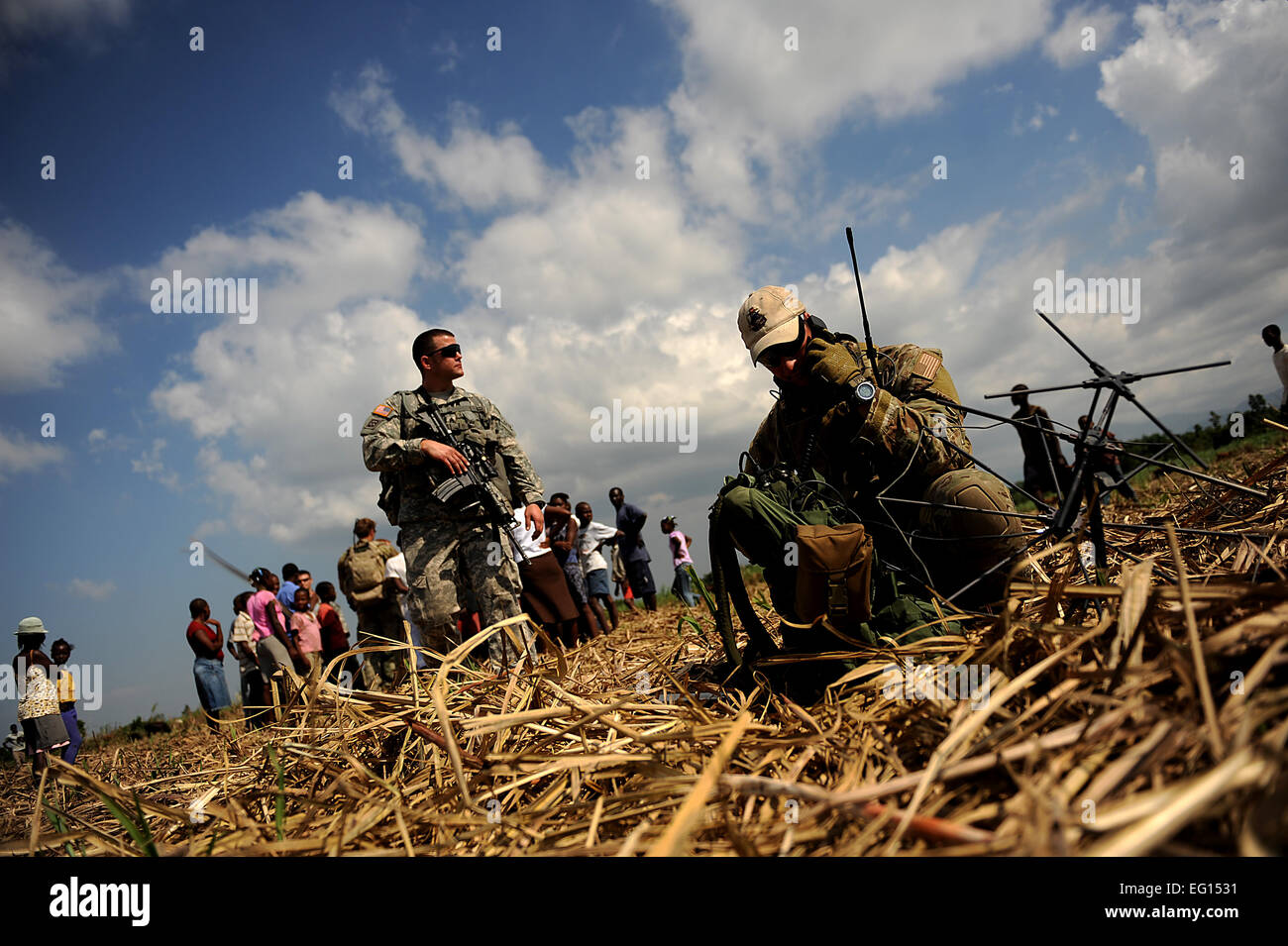 A U.S. Air Force Combat Controller radios back to the Special Tactics ...