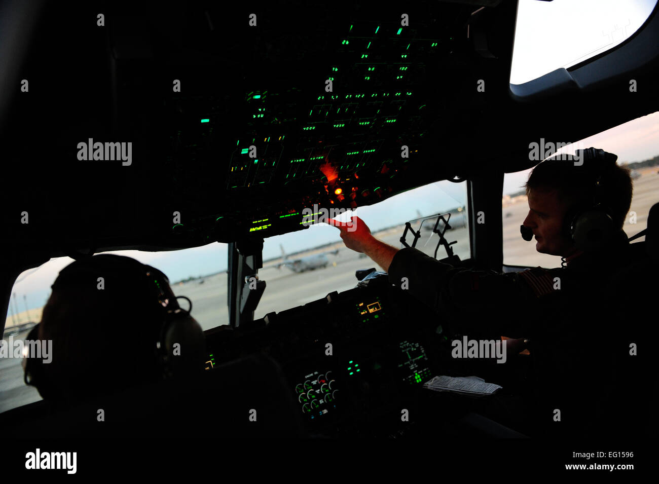 U.S. Air Force Capt. Kit Conn, and Capt. Christopher Slauson, C-17 ...