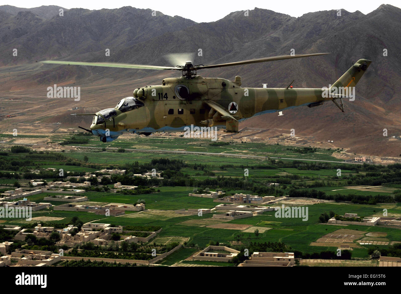 A photo taken from inside an MI-35 Hind E helicopter of another Afghan ...