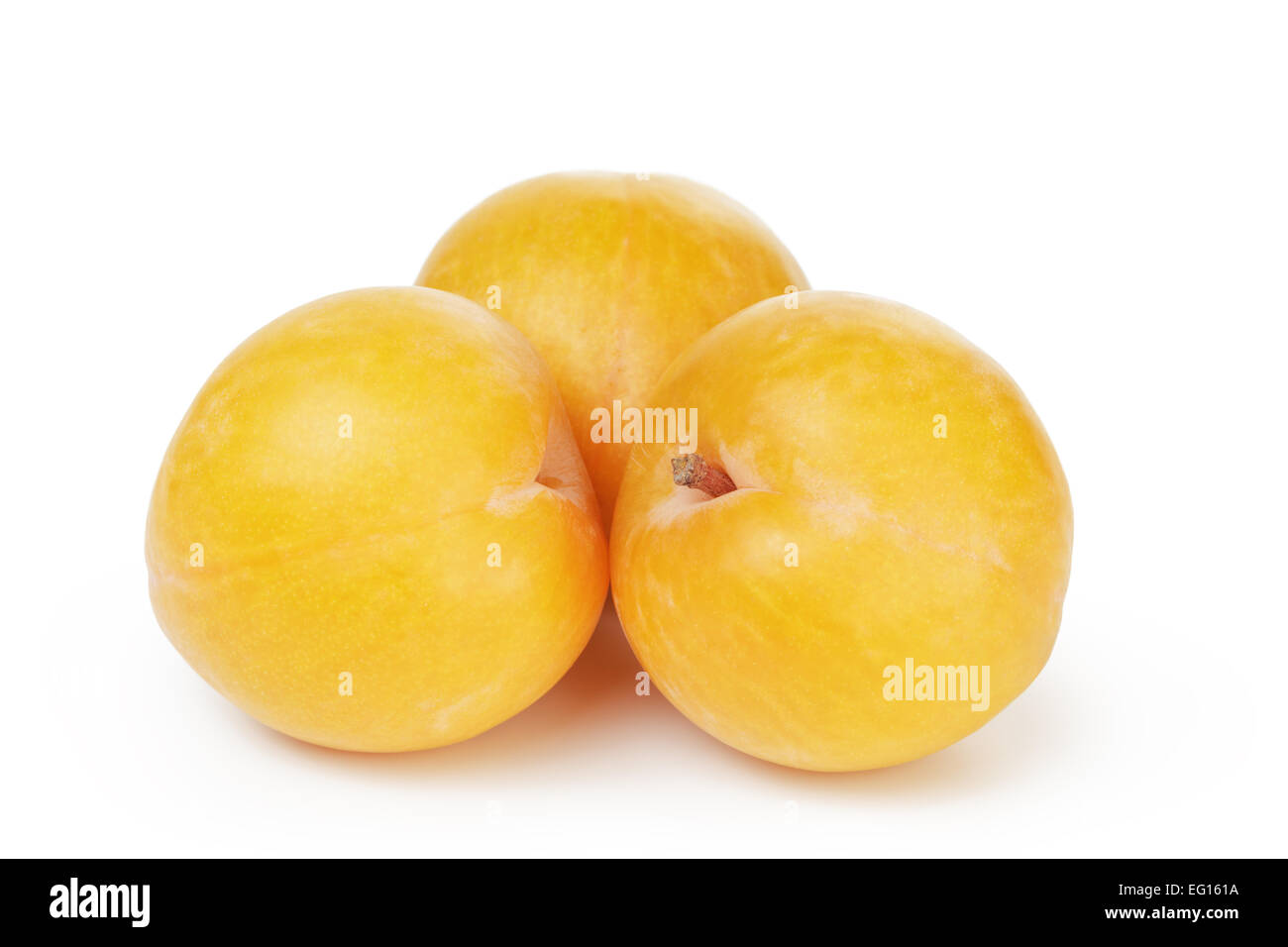 three ripe yellow plums Stock Photo - Alamy