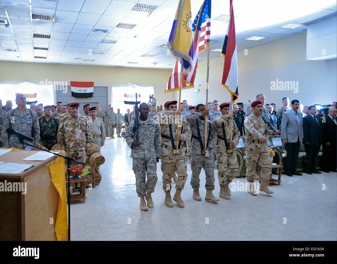 A joint Air Force, Army and Iraqi Army color guard presents the colors ...