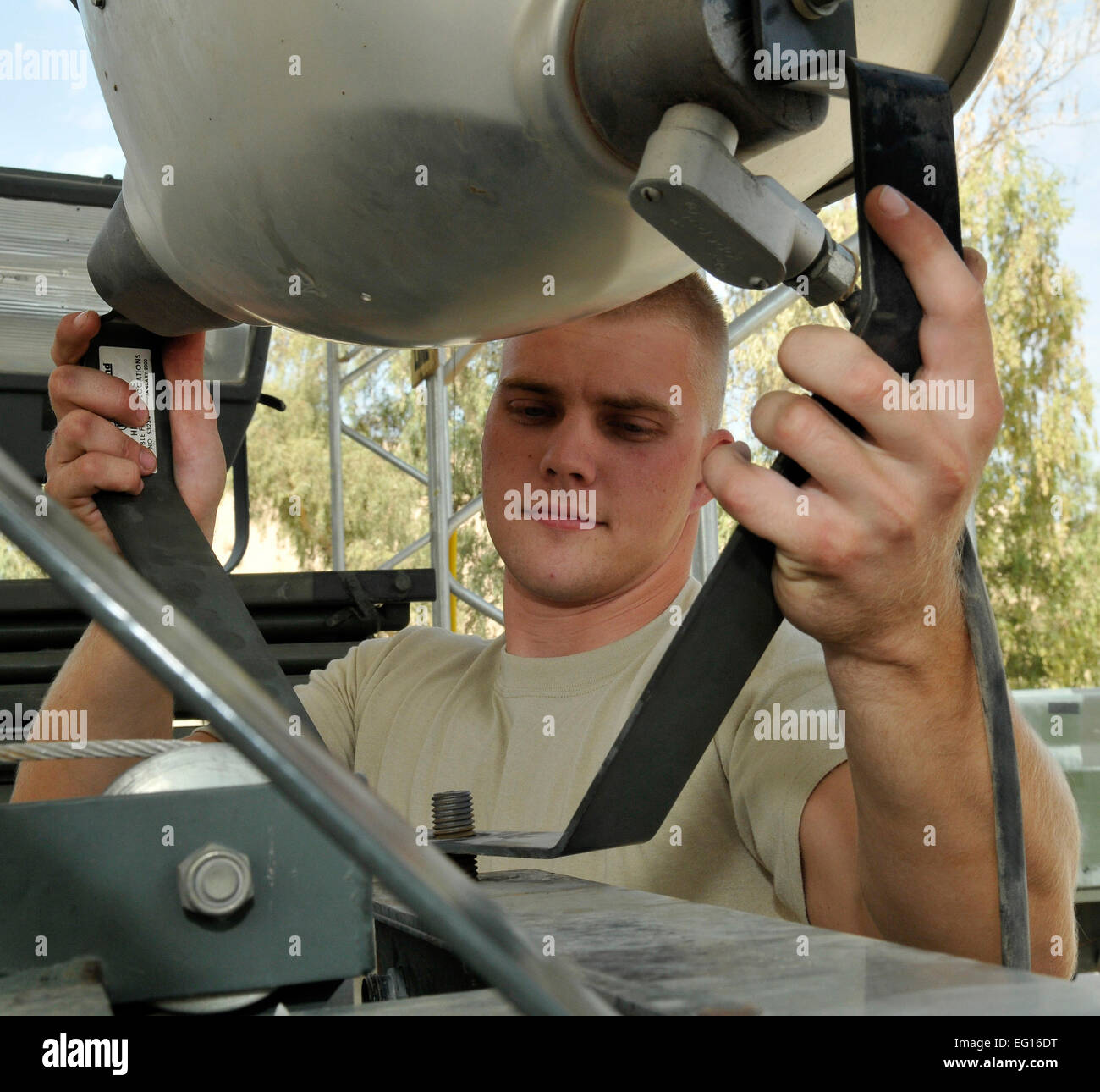 U.S. Air Force Airman 1st Class Jerry Saunders, a 332nd Expeditionary ...