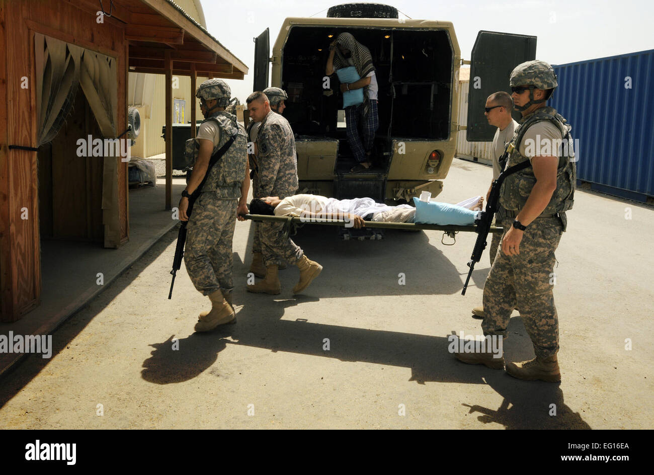 Members of the 934th Forward Surgical Team unload a patient from the ...