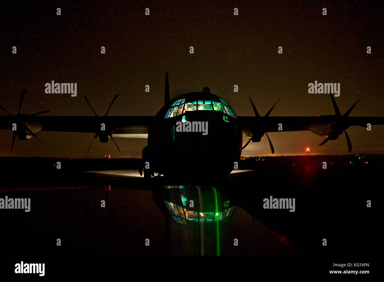A C-130 aircraft from Dyess Air Force Base, Texas, waits to be loaded ...