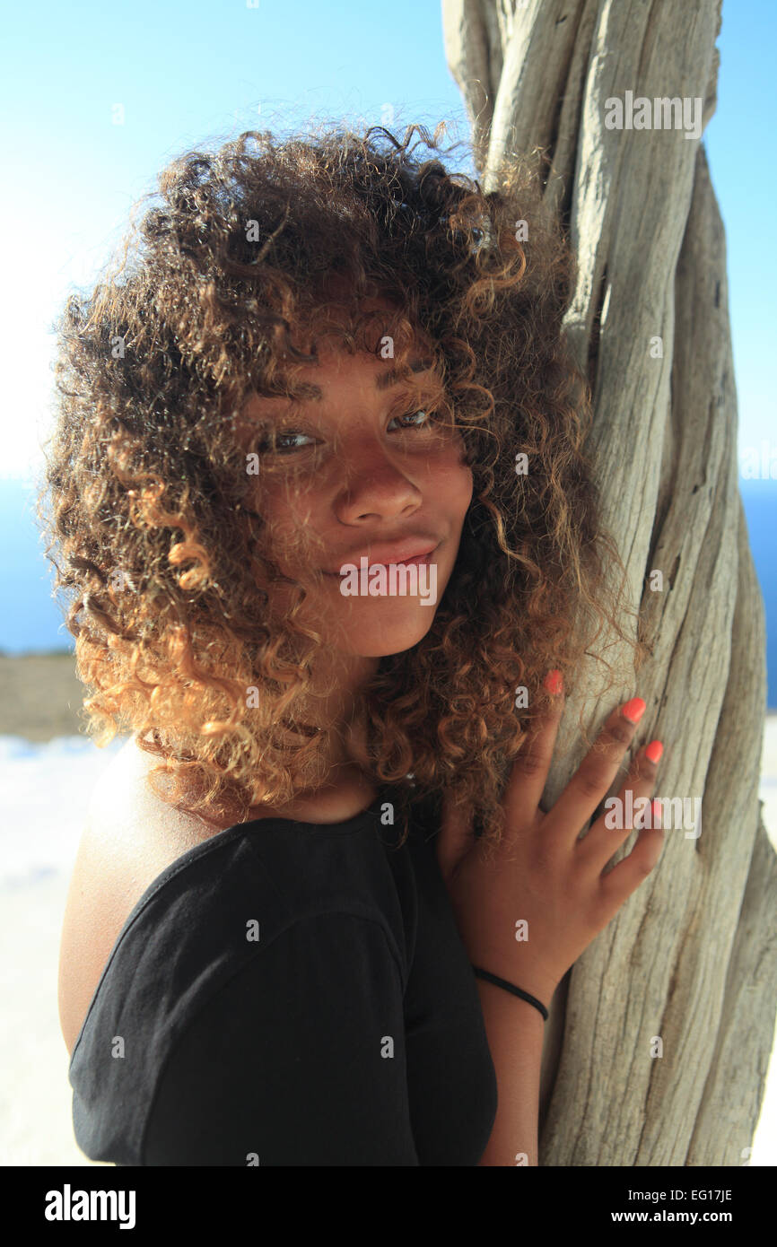 greece a young mixed race girl posing on holiday Stock Photo - Alamy