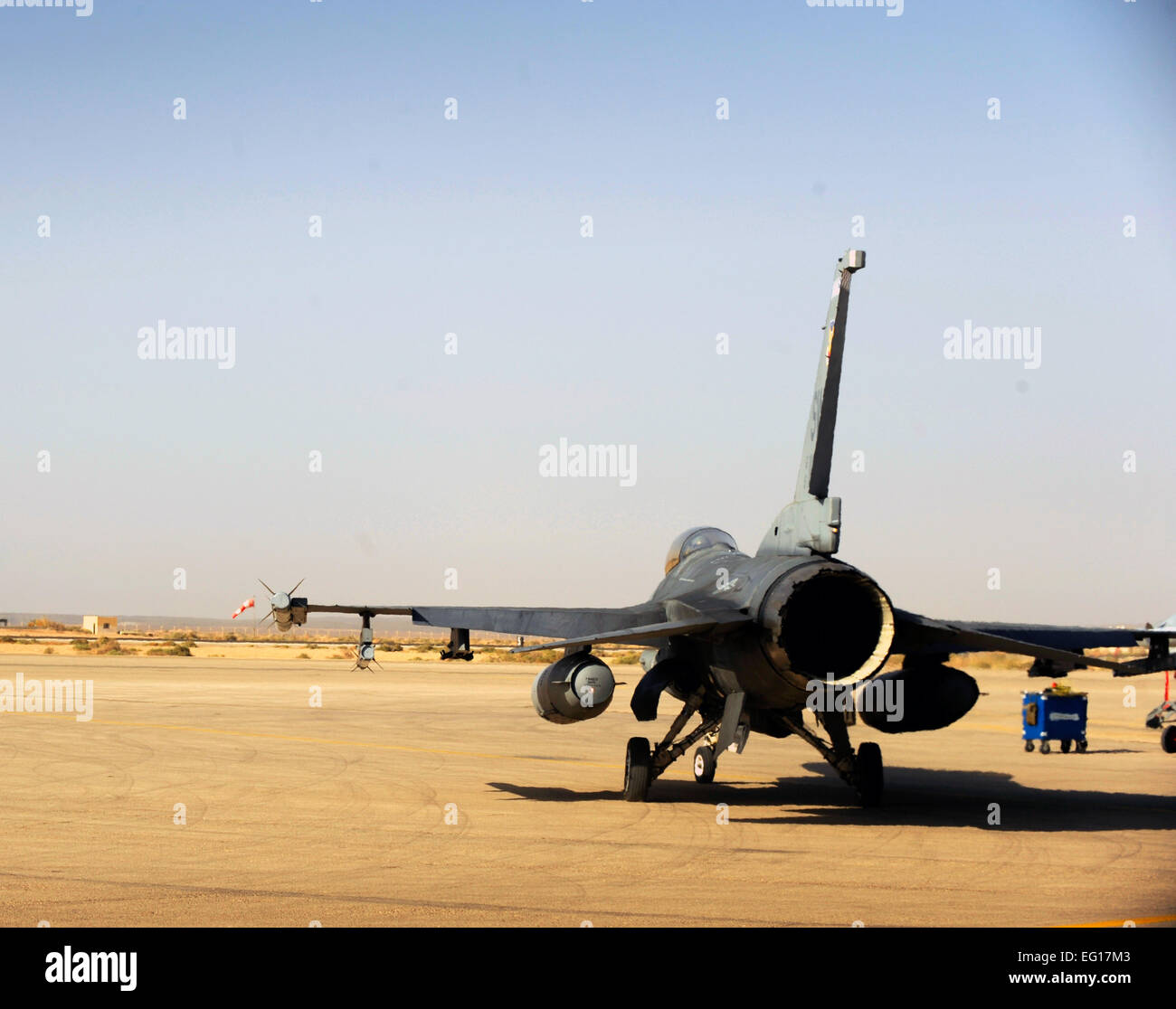 A U.S. Air Force F-16 Fighting Falcon taxis to the runway for takeoff ...