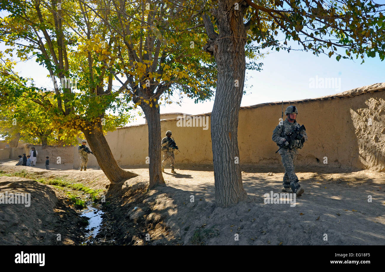 U.S. Soldiers from Provincial Reconstruction Team Zabul walk through a ...