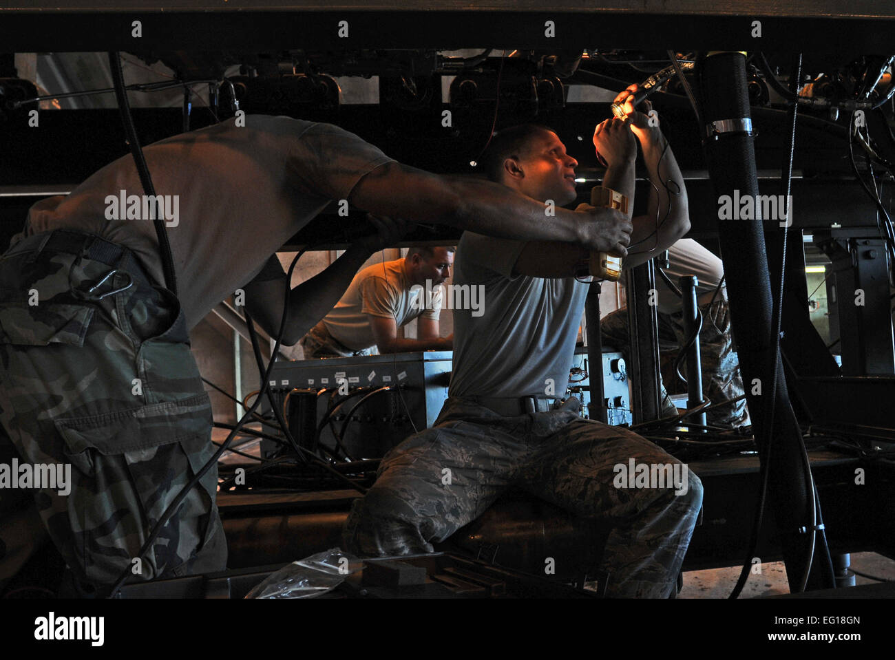 U.S. Air Force Tech. Sgt. Samuel Lee left and Staff Sgt. Robert ...