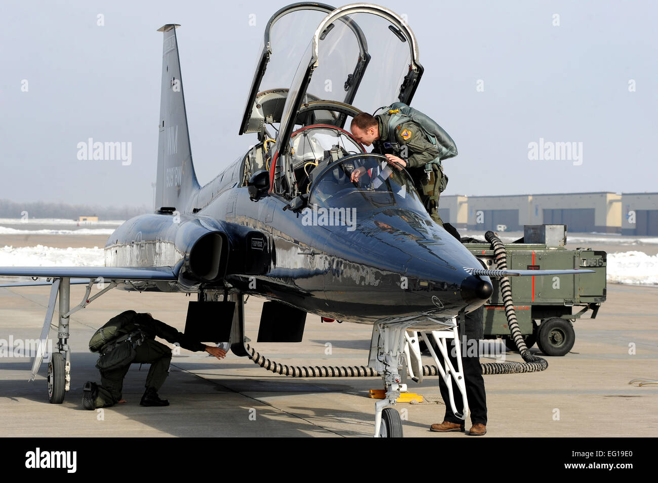 U.S. Air Force T-38 Talon pilots perform their preflight inspections ...
