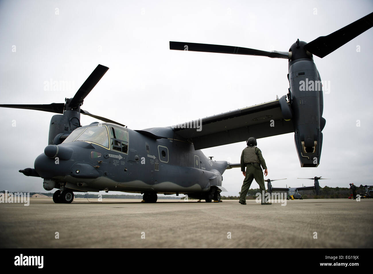 U.S. Air Force Capt. Robert Meyersohn inspects a CV-22 Osprey from the ...