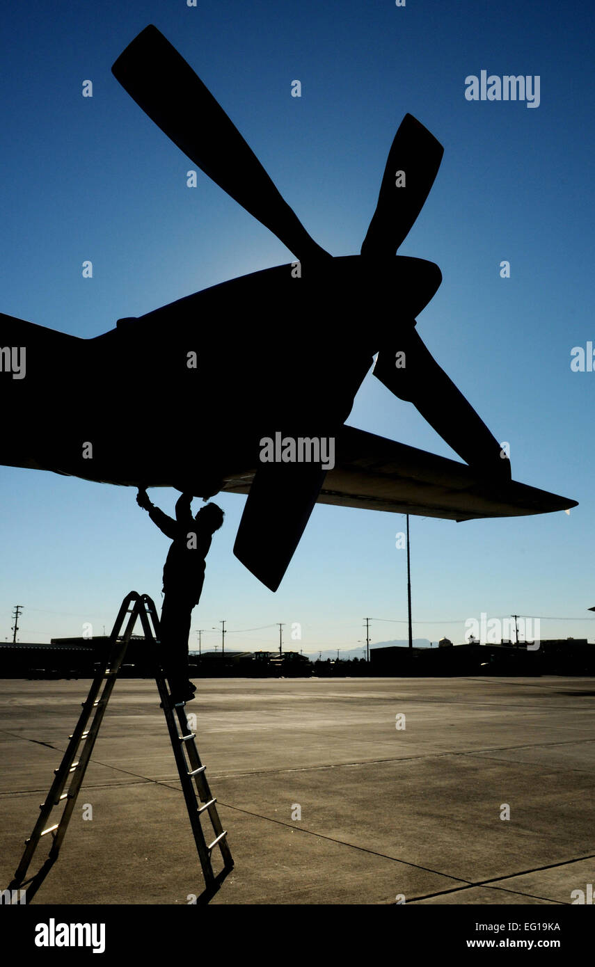 Adjutant Ludo Geens, an aircraft maintainer, marshals a C-130 Hercules ...