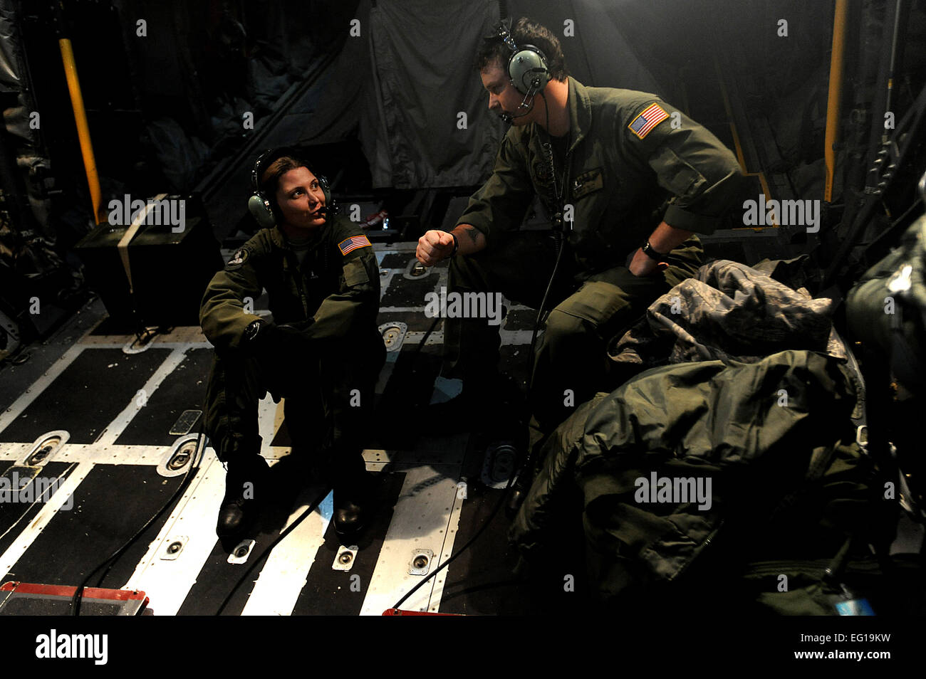 U.S. Air Force AC-130U gunship aerial gunners Staff Sgt. Mark Riley and ...