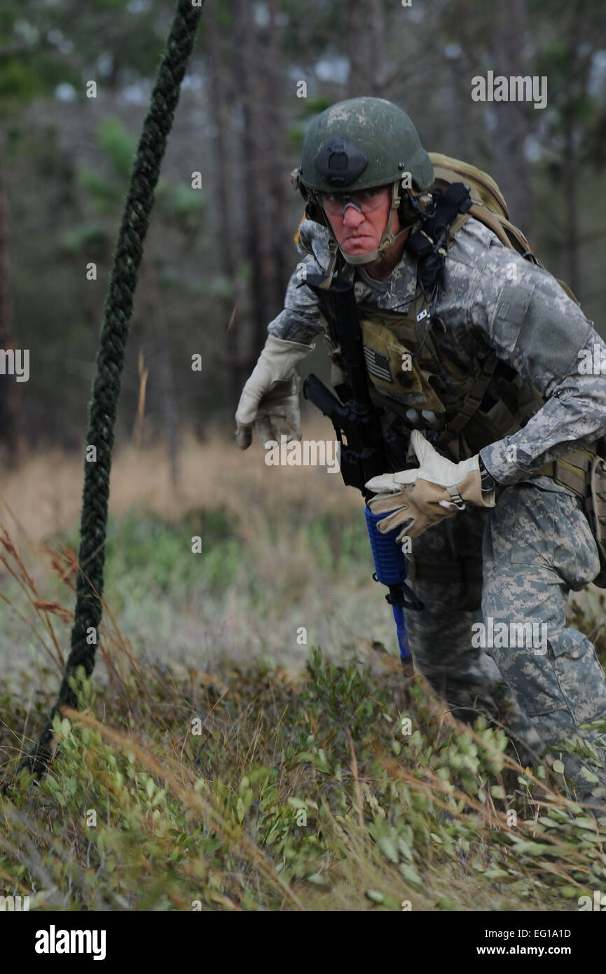 U.S. Army Special Forces fast rope from various helicopters during ...