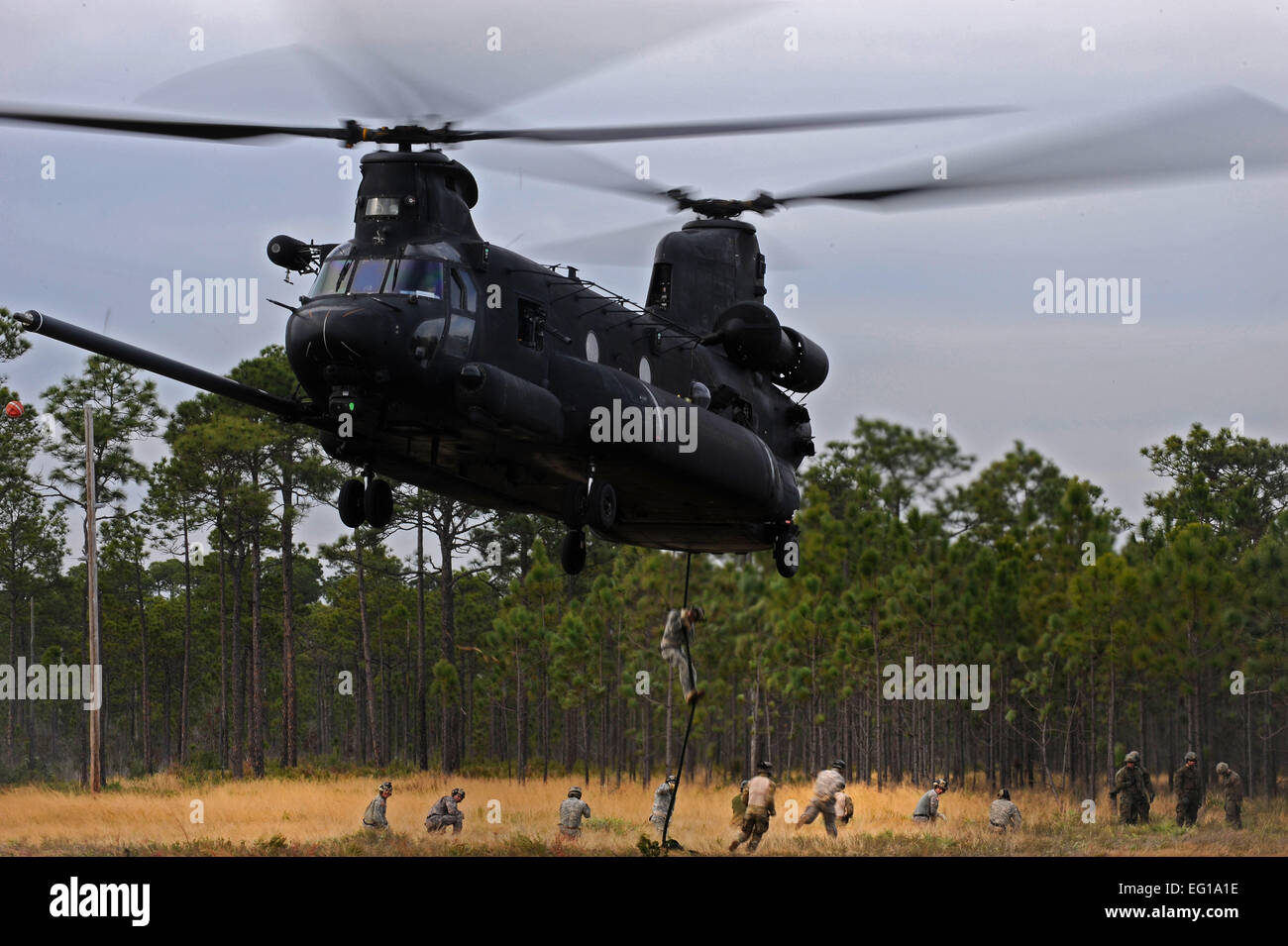 U.S. Army Special Forces fast rope from various helicopters during ...