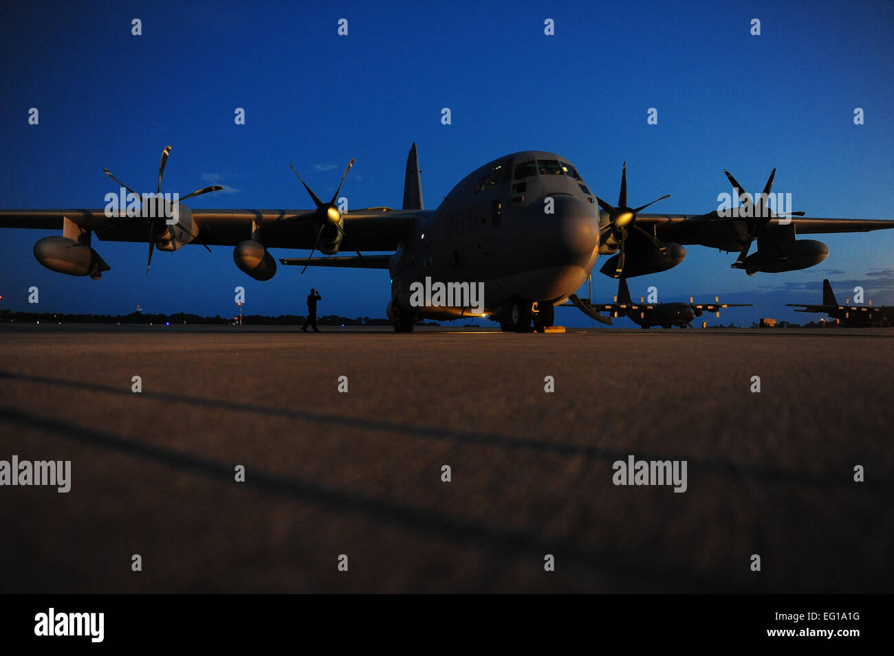 A Marine KC-130-J is prepared to begin an aerial refueling mission ...