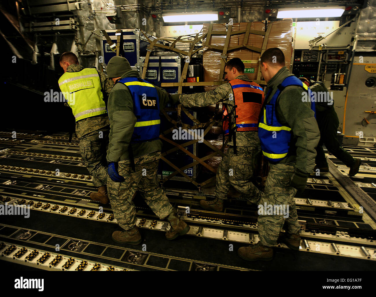U.S. Air Force Aerial Porters from Misawa Air Base, Japan, off load ...