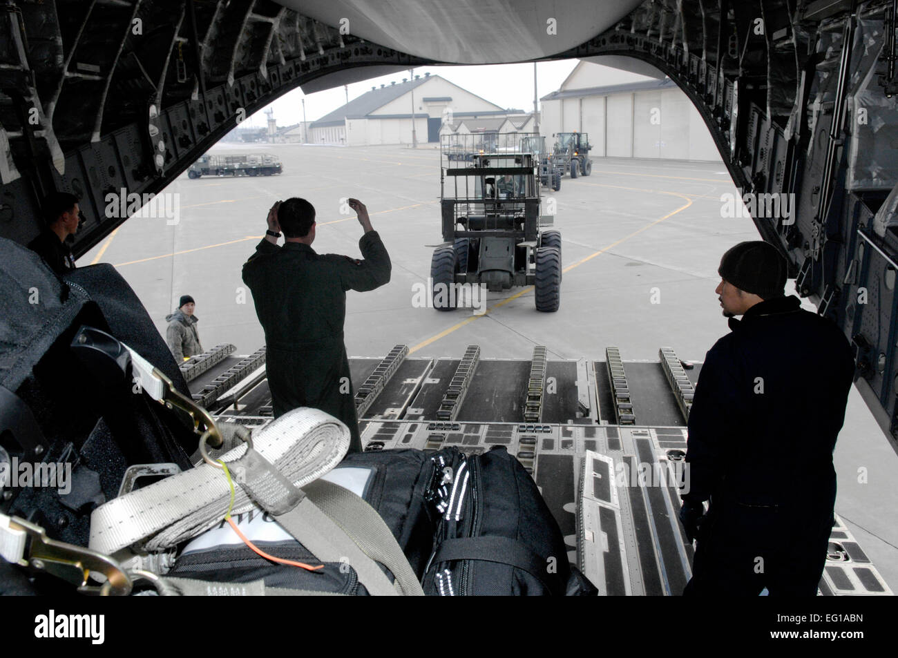 U.S. Air Force Airman 1st Class Rick Eld, a loadmaster with the 4th ...