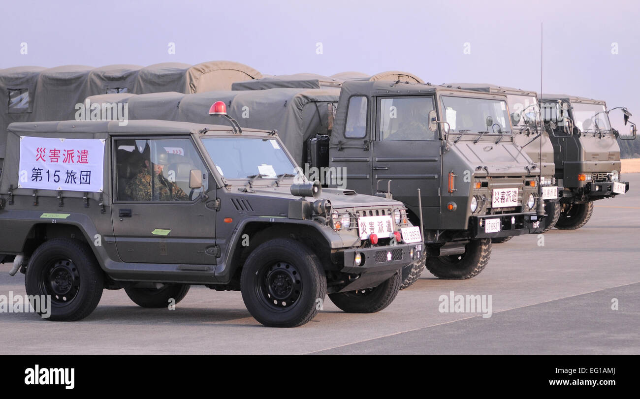 Japan Ground Self-Defense Force JGSDF members unload vehicles at Yokota ...
