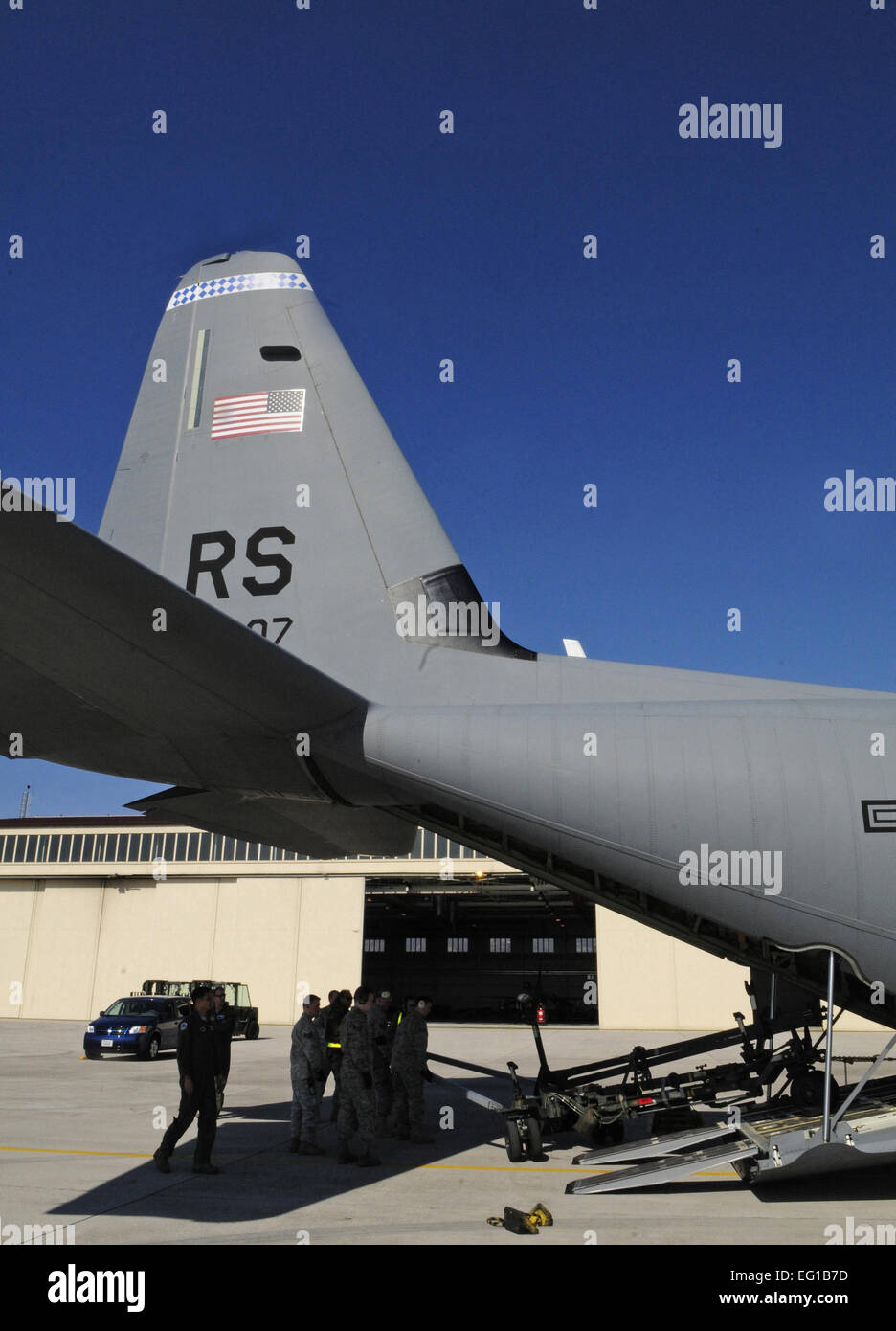 Personnel unload cargo from hi-res stock photography and images - Alamy