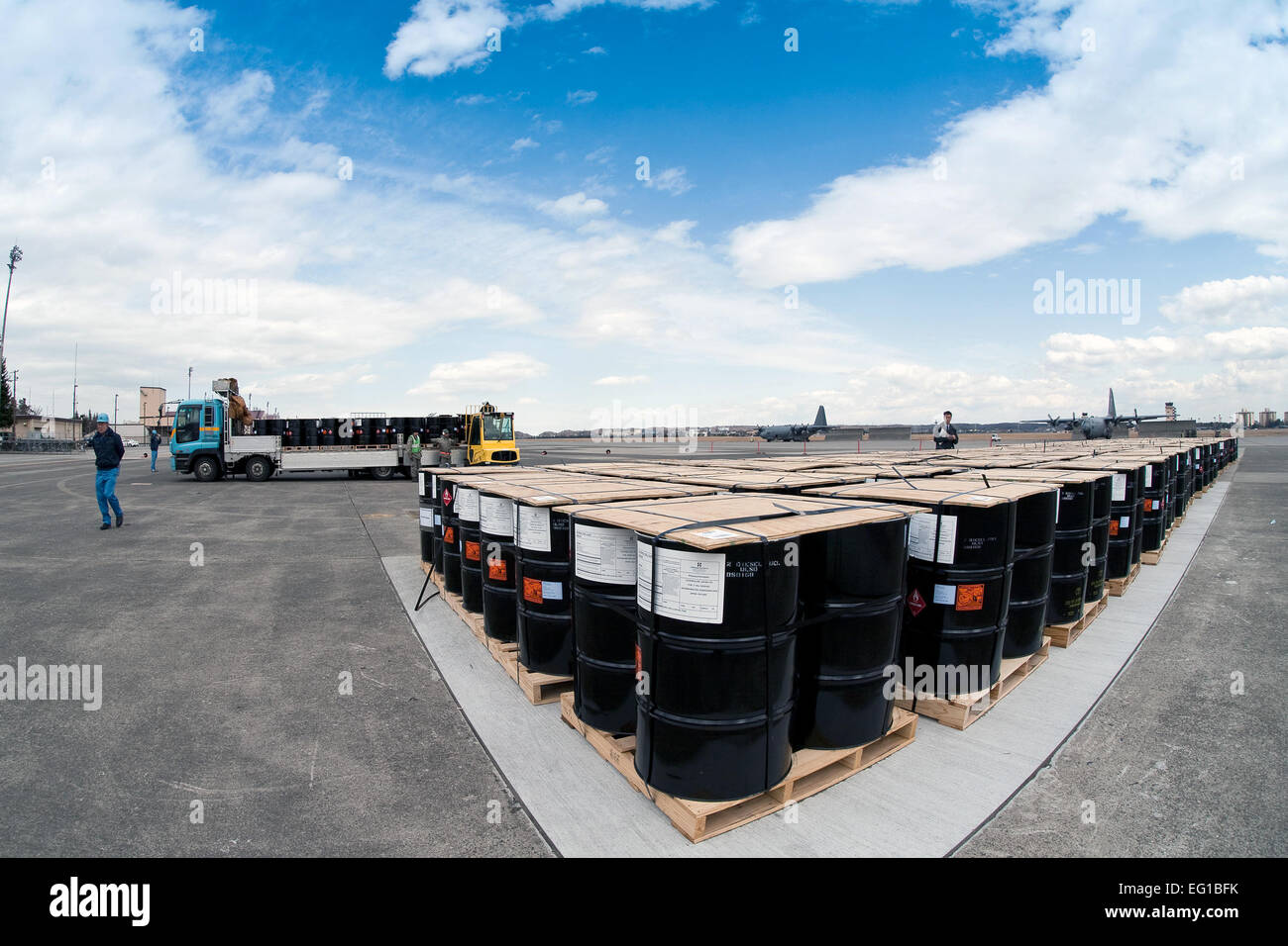 Sixteen Japanese trucks pick up 116 pallets of diesel fuel from Yokota ...