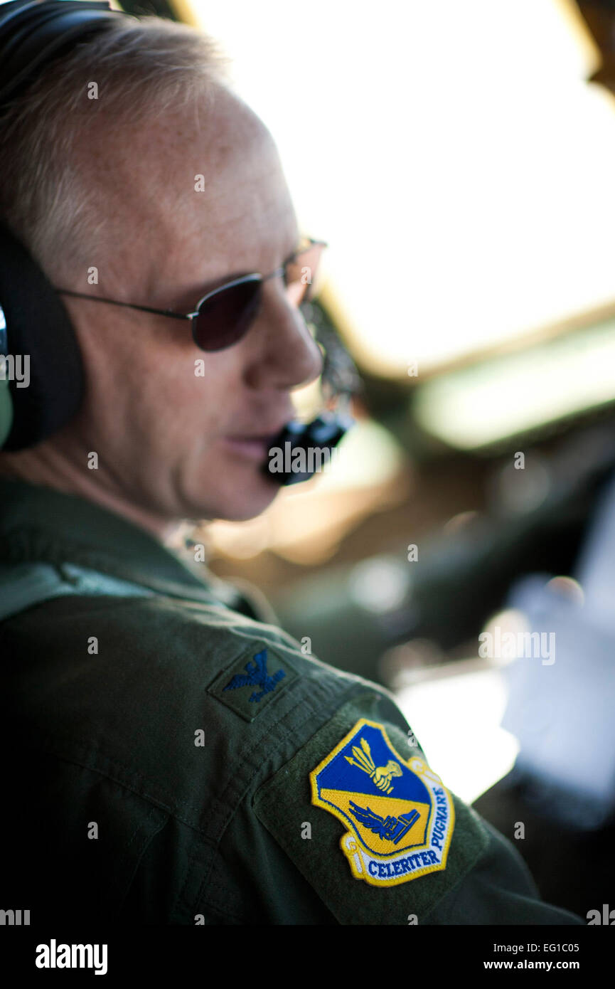 OVER JAPAN -- Col. Otto Feather, 374th Airlift Wing commander, looks ...