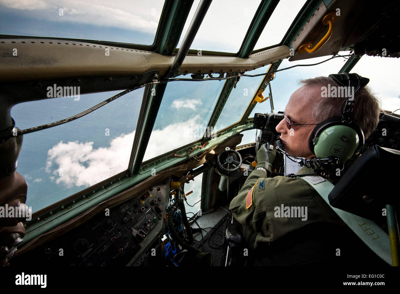 OVER JAPAN -- Col. Otto Feather, 374th Airlift Wing commander, looks ...