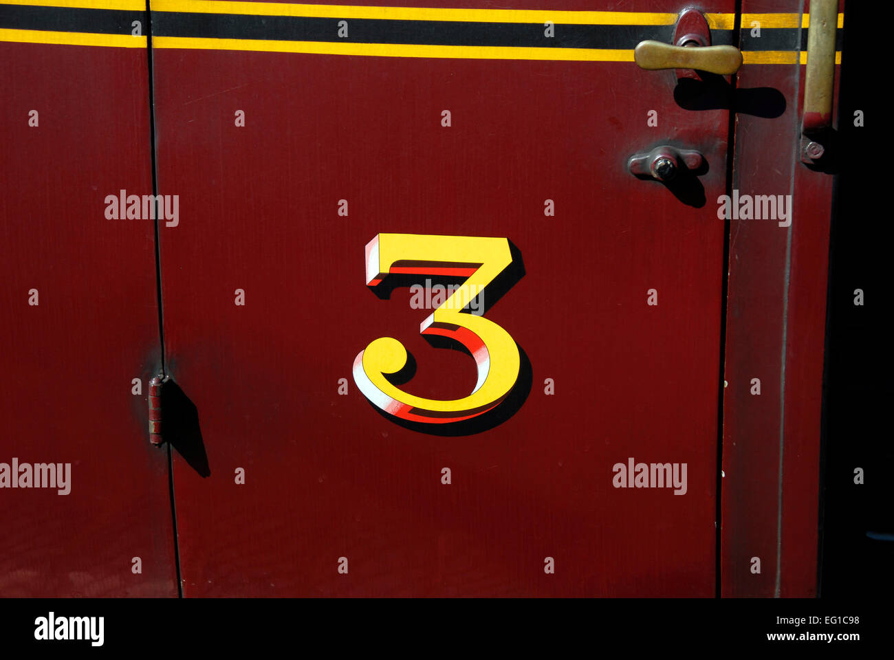 Figure 3 on outside of railway carriage door indicating third class ...