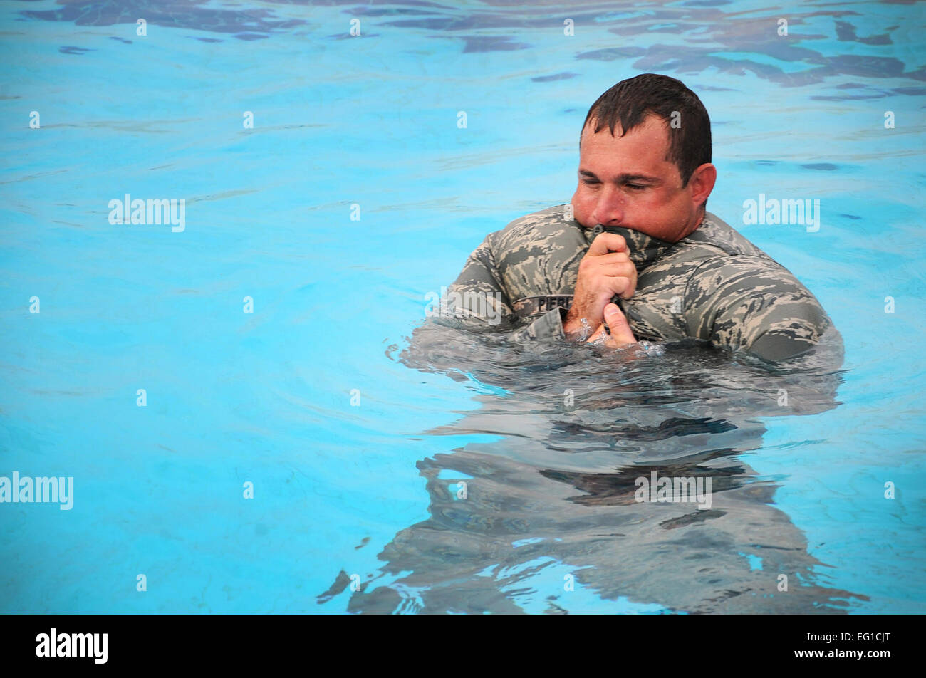 U.S. Air Force Lt. Col. Ronald Pieri inflates his blouse during Marine ...