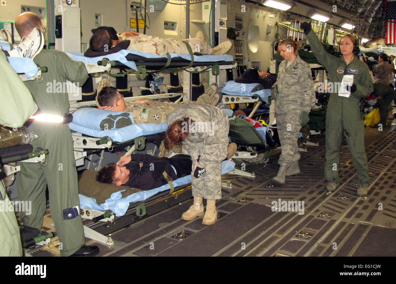 An aeromedical evacuation crew makes final checks on wounded warriors ...